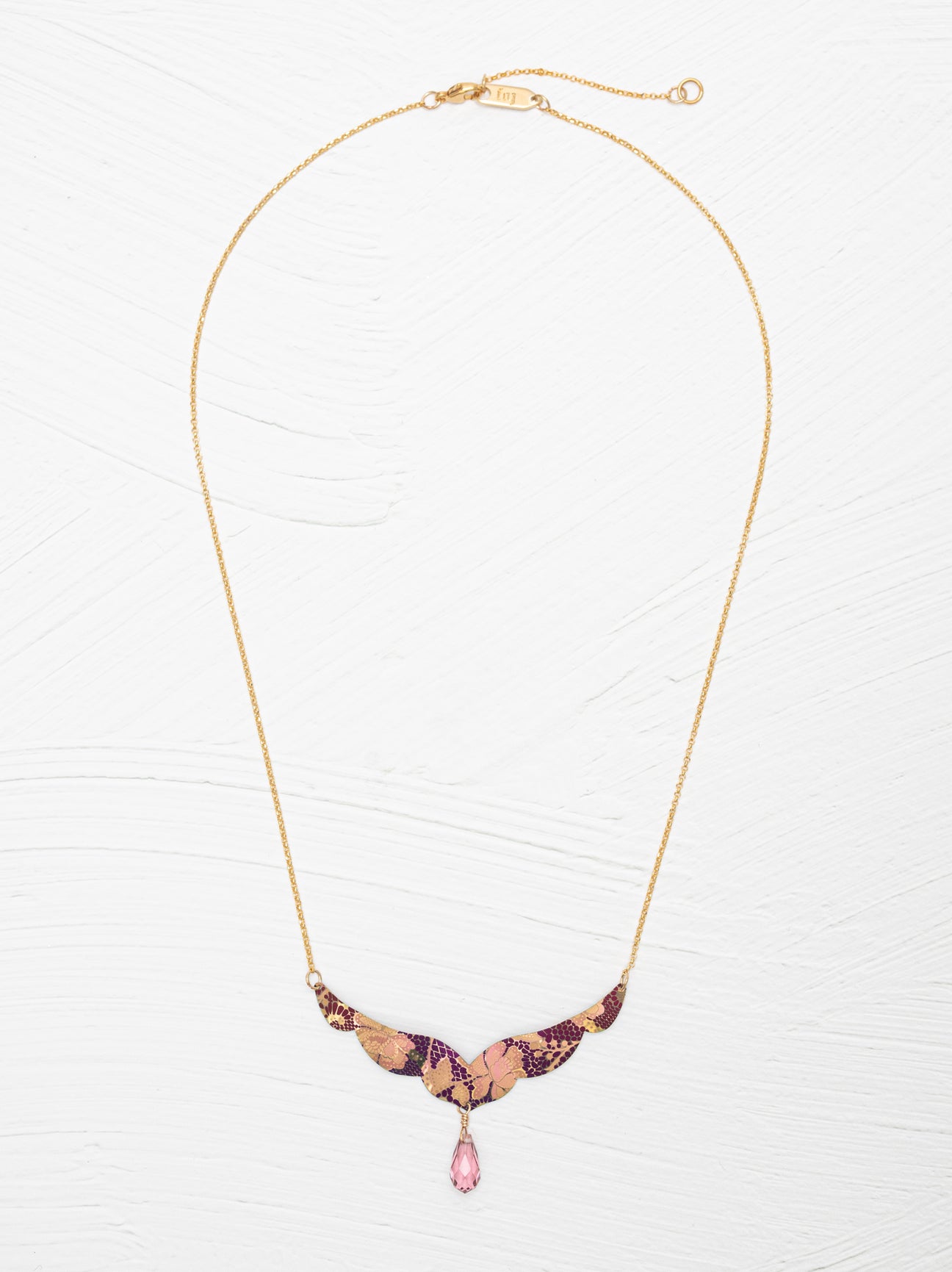 The Isla Necklace marvels with delicate lace patterning on niobium ...